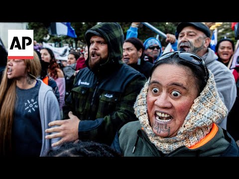Protest outside New Zealand’s Parliament as it debates suspending Māori lawmakers who performed haka