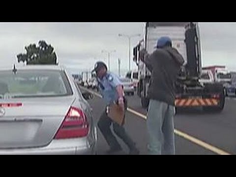 Officer shot at point-blank range during traffic stop