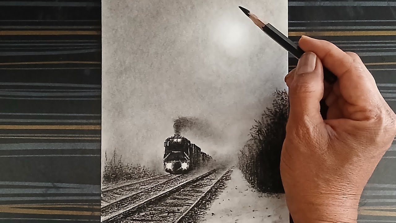 How to draw a landscape drawing of a moving steam train step by step using charcoal pencils.