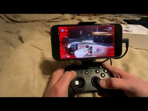 Rotor Riot IOS gaming controller hooked up to an IPhone 14 Pro Max. Review.
