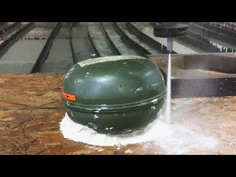 Inside a German Land Mine/MRE/Gas Mask? cut in half with a 60,001 PSI Waterjet
