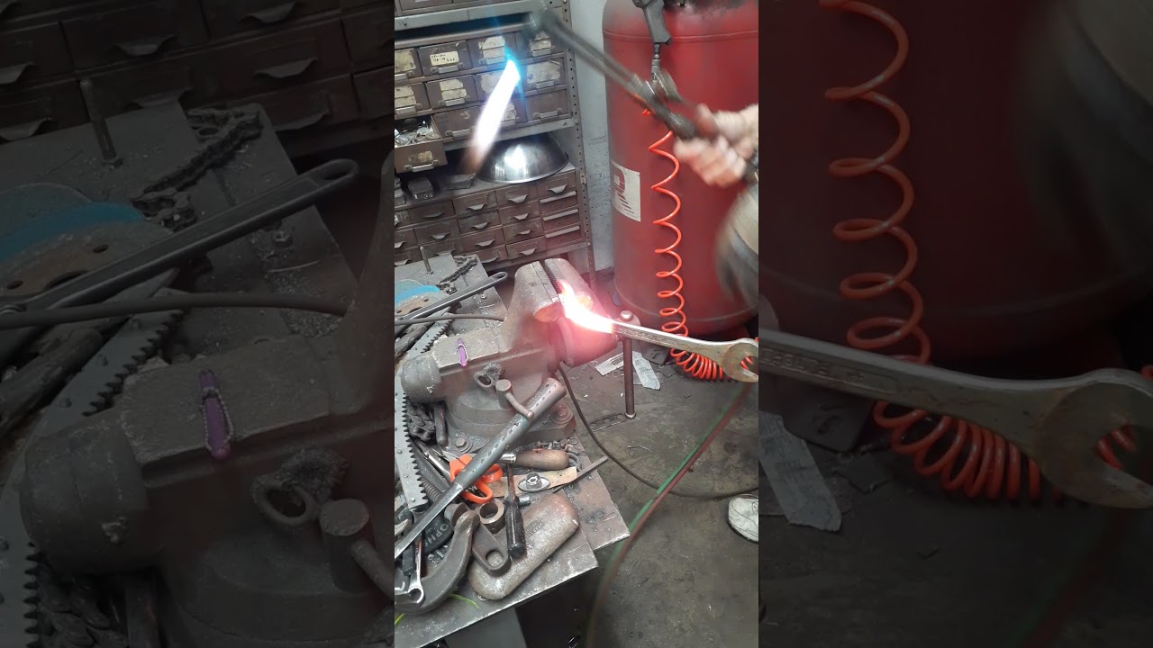 Rollie Gee Heating and Bending wrenches for a table.