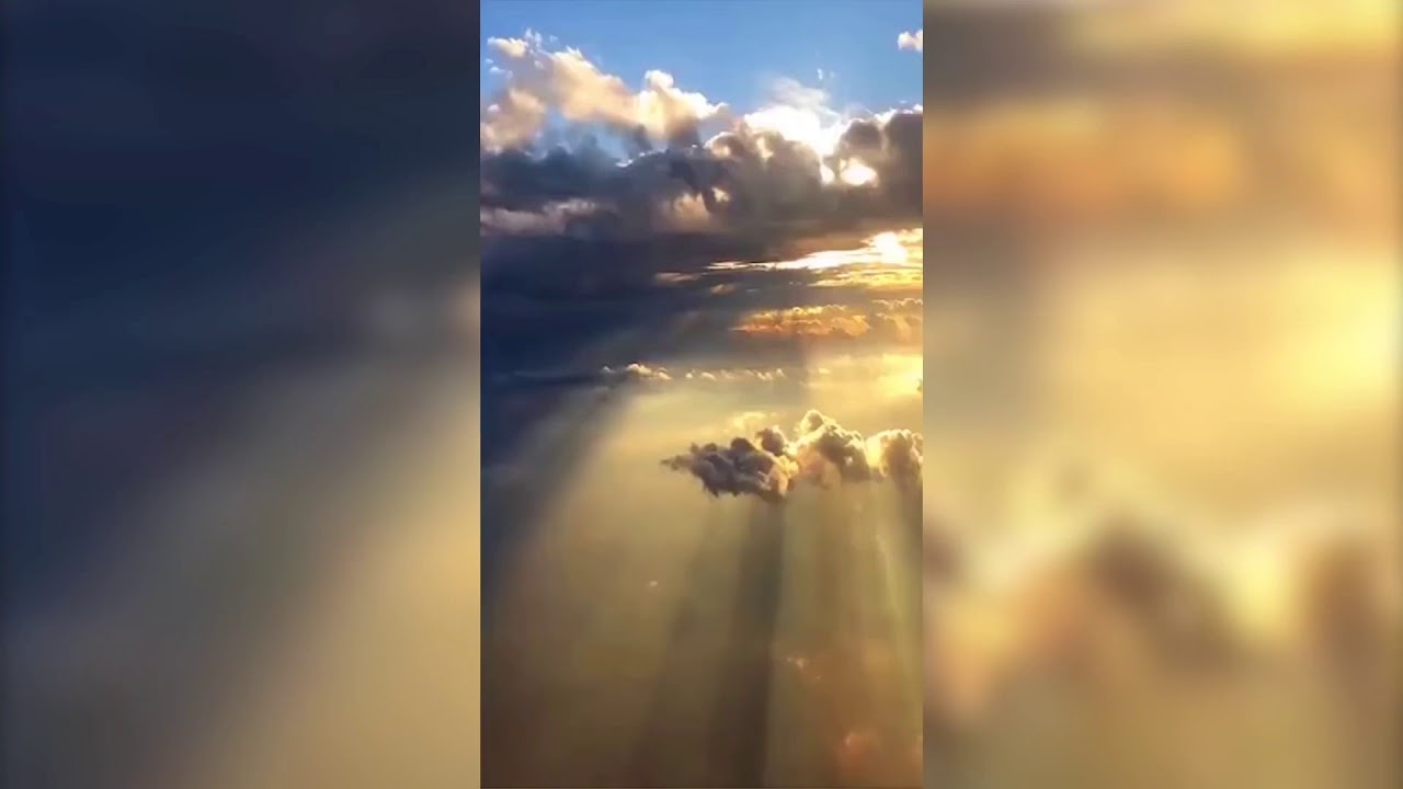 Flight clouds sun rays Live Wallpaper portrait video