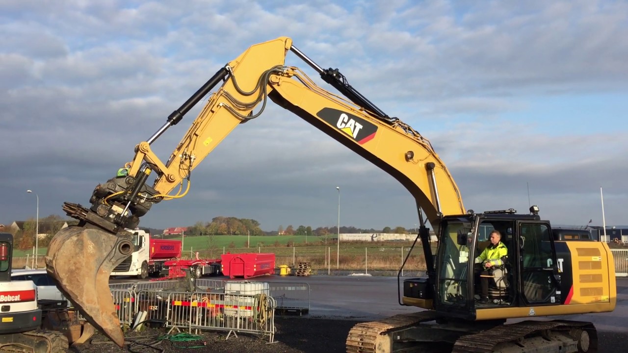 Cat 320E L Bandgrävare med tiltrotator och flera skopor