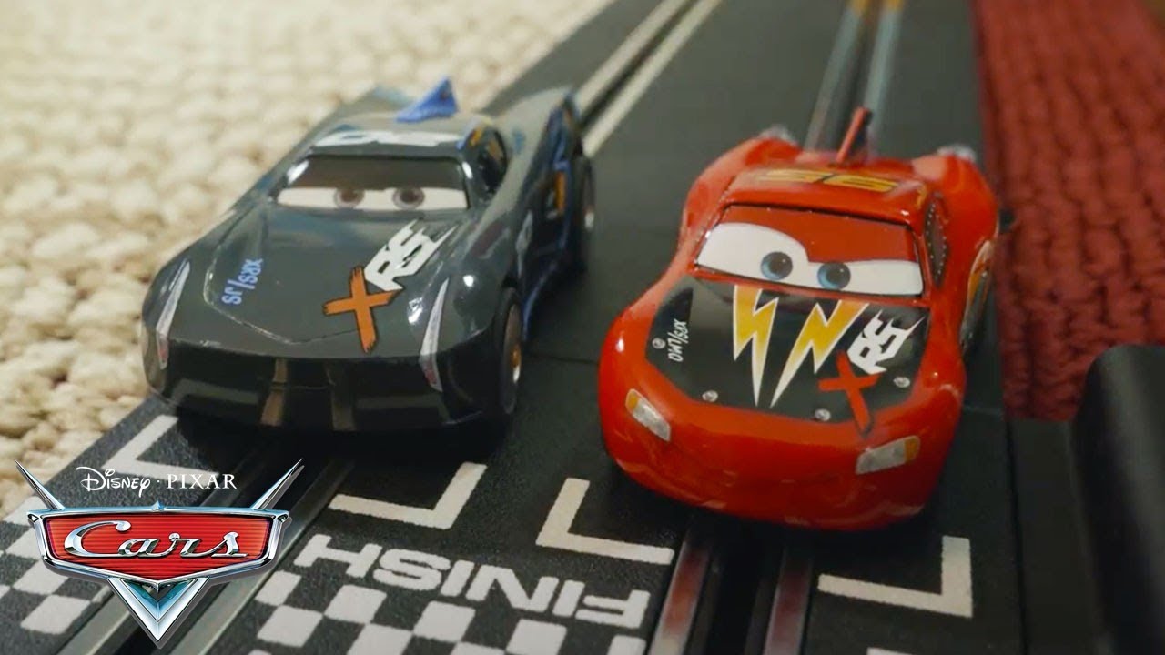 Lightning McQueen vs. Jackson Storm Race | Pixar Cars | @disneyjr