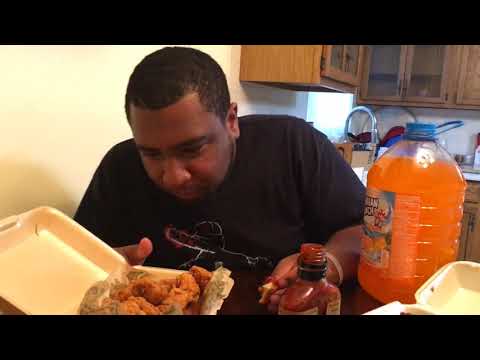 Eating Wing Stop Wings With Hot Hot Sauce!