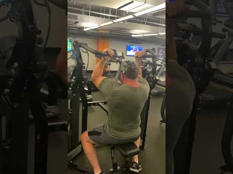 Mike Martin hammers his biceps on the MTS Hammer Strength machine on 6/8/23.
