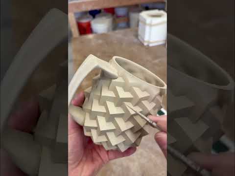 Making one of my newest designs the Super Cubes Mug. Handmade in high fire porcelain.