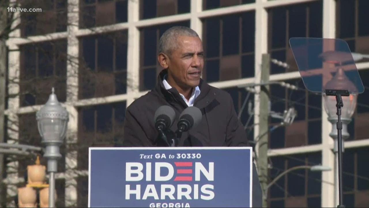 Obama tells crowd 'Don't boo, vote' against Trump
