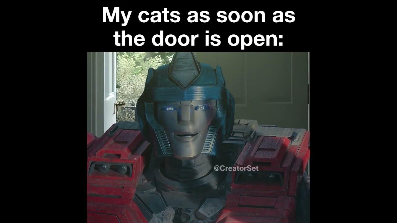 Optimus Prime running away like a Cat meme