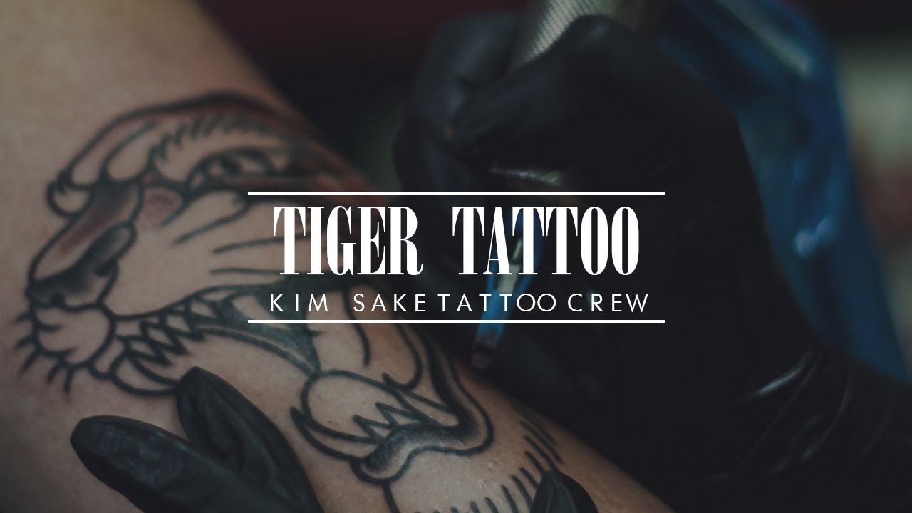 Traditional tiger tattoo by Kim SakeTattooCrew