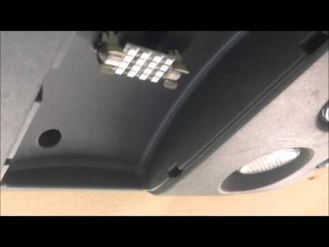 How to access the interior lights in a 2001 GMC Jimmy
