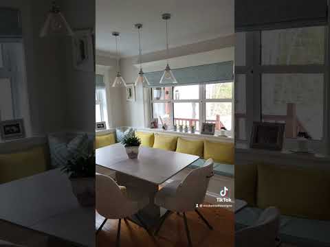 We created banquet seating in this dining area, a great seating solution in a smaller room.