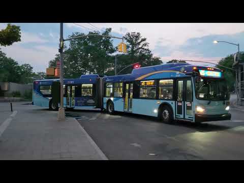 NEW FLYER XCELSIOR 60 FOOT ARTICULATED NEW YORK CITY BUS 6104 ON THE M15 AT THE STATEN ISLAND FERRY