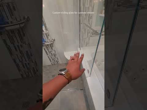 Custom Sliding glass enclosure for a curbless shower #curbless #showerdoor #bathroom