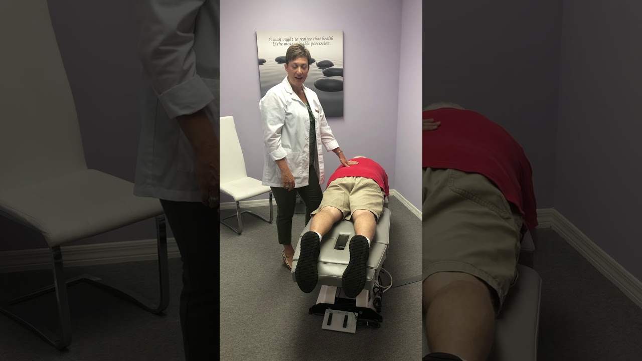 Chiropractic Adjustment using a drop table.