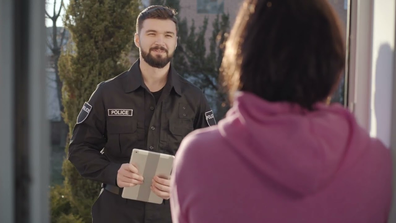 Police officer and woman 100% FREE STOCK FOOTAGE