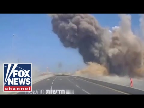DRAMATIC new video shows missile striking Israeli roadside