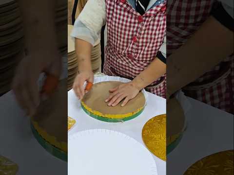 Real-life footage reveals production: The golden cake trays in the factory are fascinating #cake