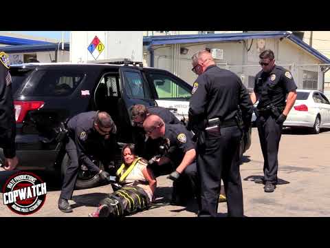 Copwatch | Woman Placed in Body Wrap & Spit Sock After Causing ...