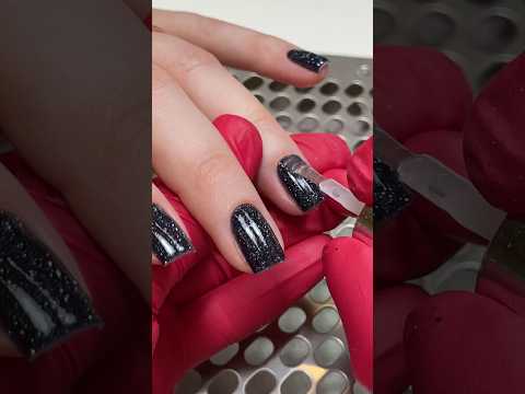 Top coat with no UV filter for black colours, or youβll end up having blue nails in the daylight