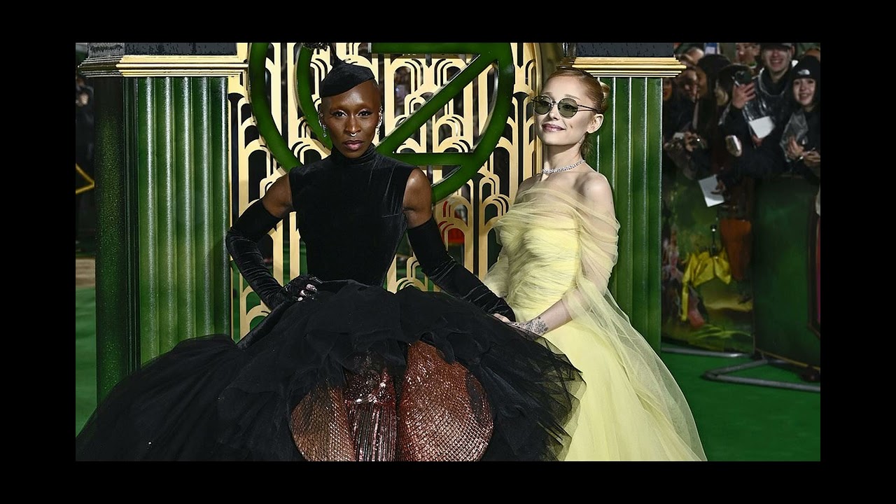 Ariana Grande looks ethereal in a flowing yellow gown while Cynthia Erivo sports a futuristic black