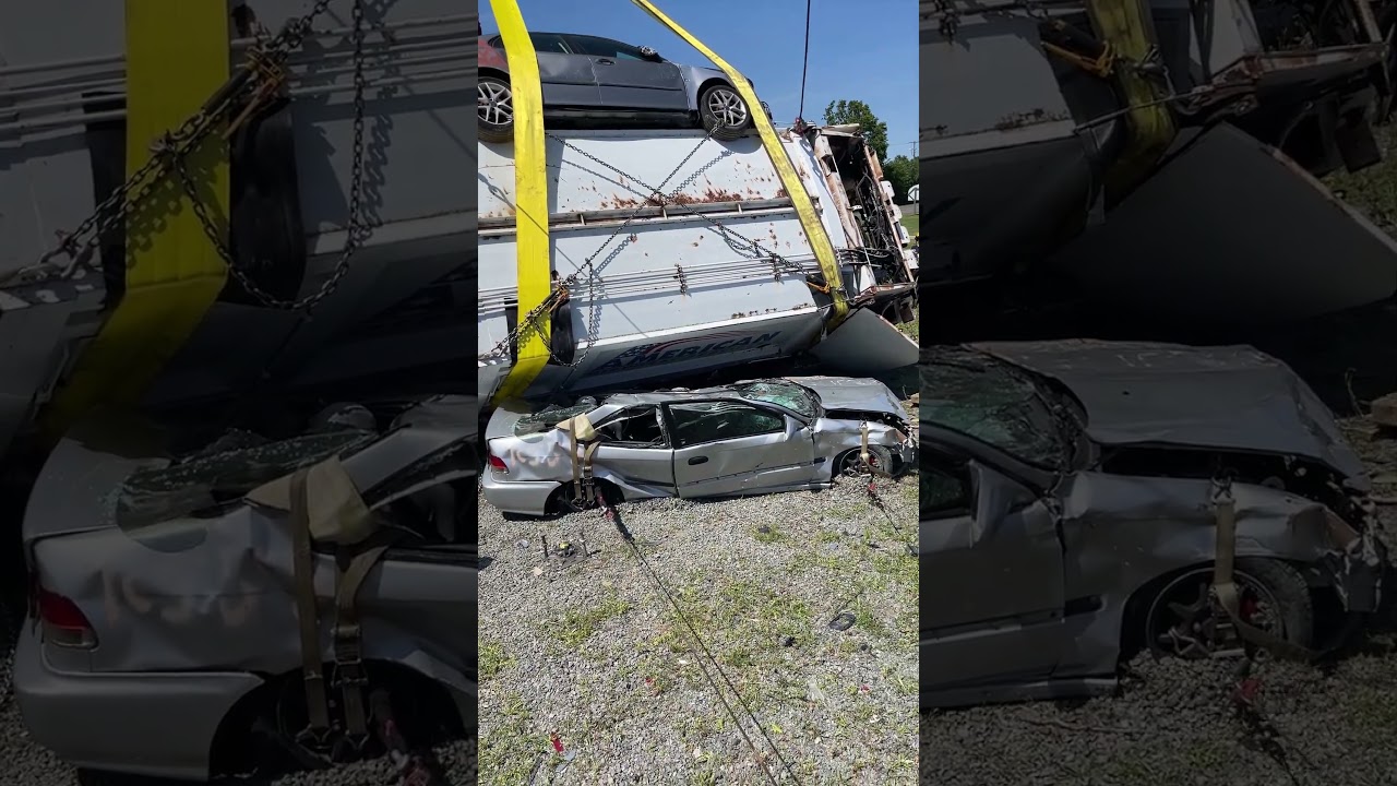 Using Wrecker to Extract Car from Under Large Truck