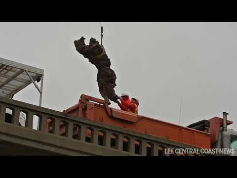 Caltrans workers cleanup debris and trash near Highway 246 in Lompoc
