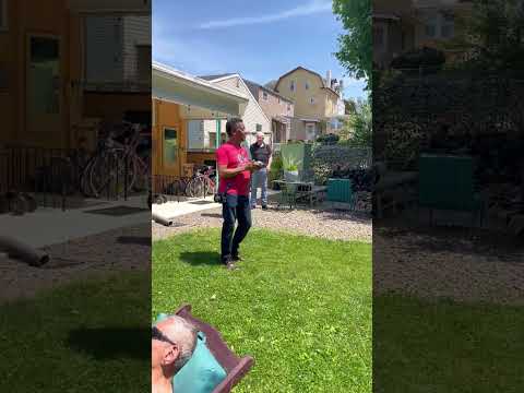 Behind The Scenes: Photographer  Sets Up Drone Shot While Crew Members Place Models in Position.