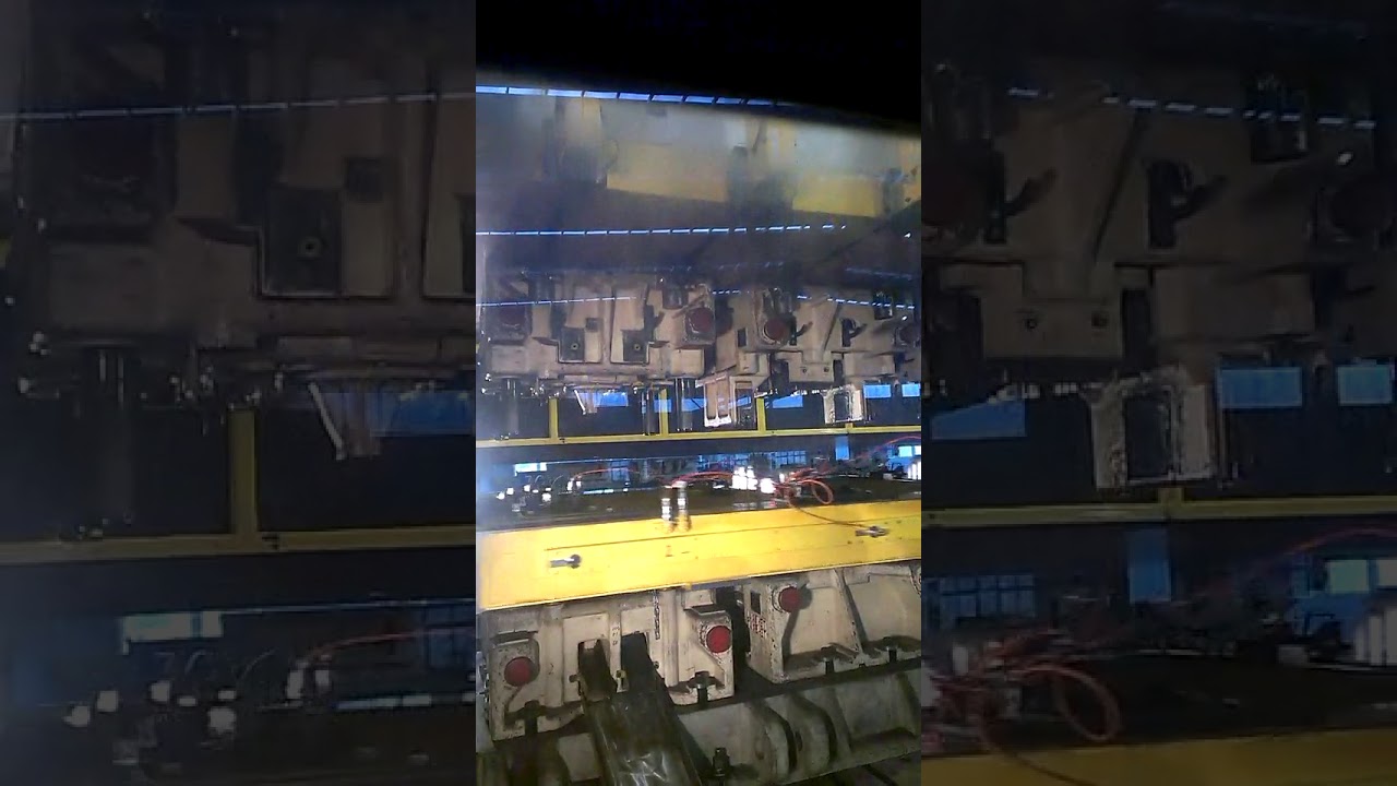 End-of-Arm Tooling solution with 180 degrees rotation on a transfer press application.