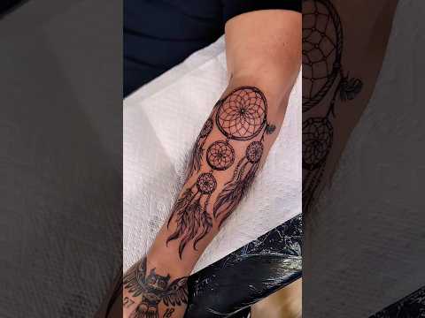 “Timeless Dreamcatcher Ink | Black & Grey Forearm Tattoo ✨🪶”#tattoodesign #dreamcatcher