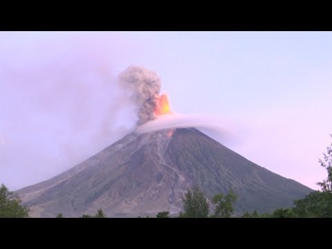 Philippines volcano spewing lava creates dazzling, dangerous conditions