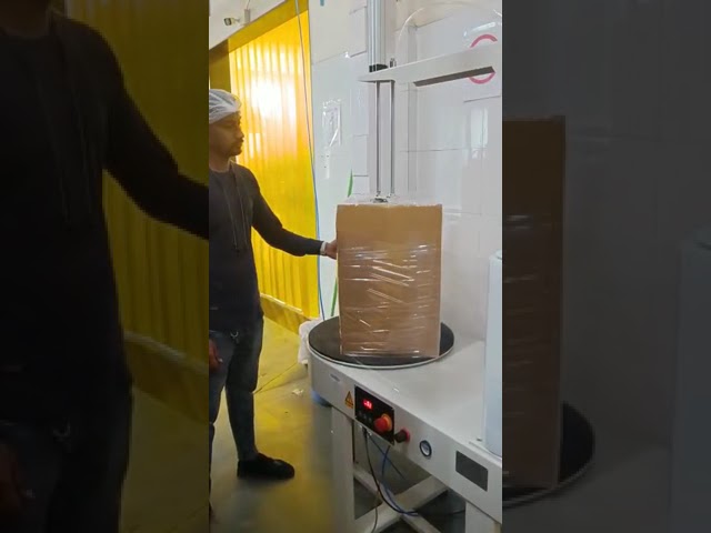 Roll Stretch Wrapping Machine - Pneumatic Box Wrapping Machine ...