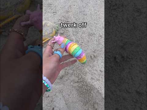 THROWING MY FIDGETS IN THE SAND! 😱🏖️ *rip pop its*