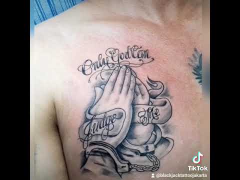 praying hand tattoo