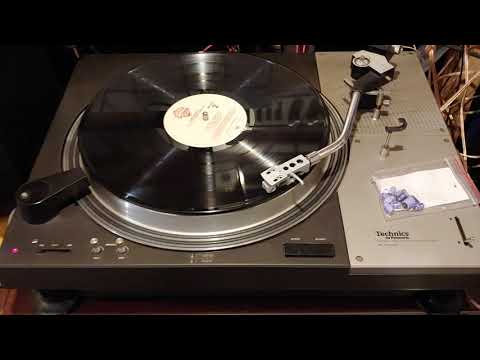 Recapped Technics SL-1100A paired with a MCS 3212 Receiver