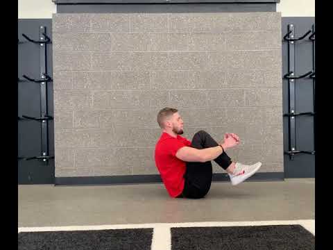 Hollow Body Knee Hugs