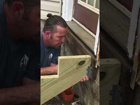 Stair stringer + plus joist hanger. You can do this!