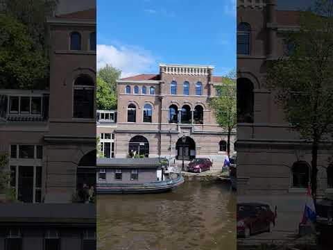 Walking along the canal in Amsterdam