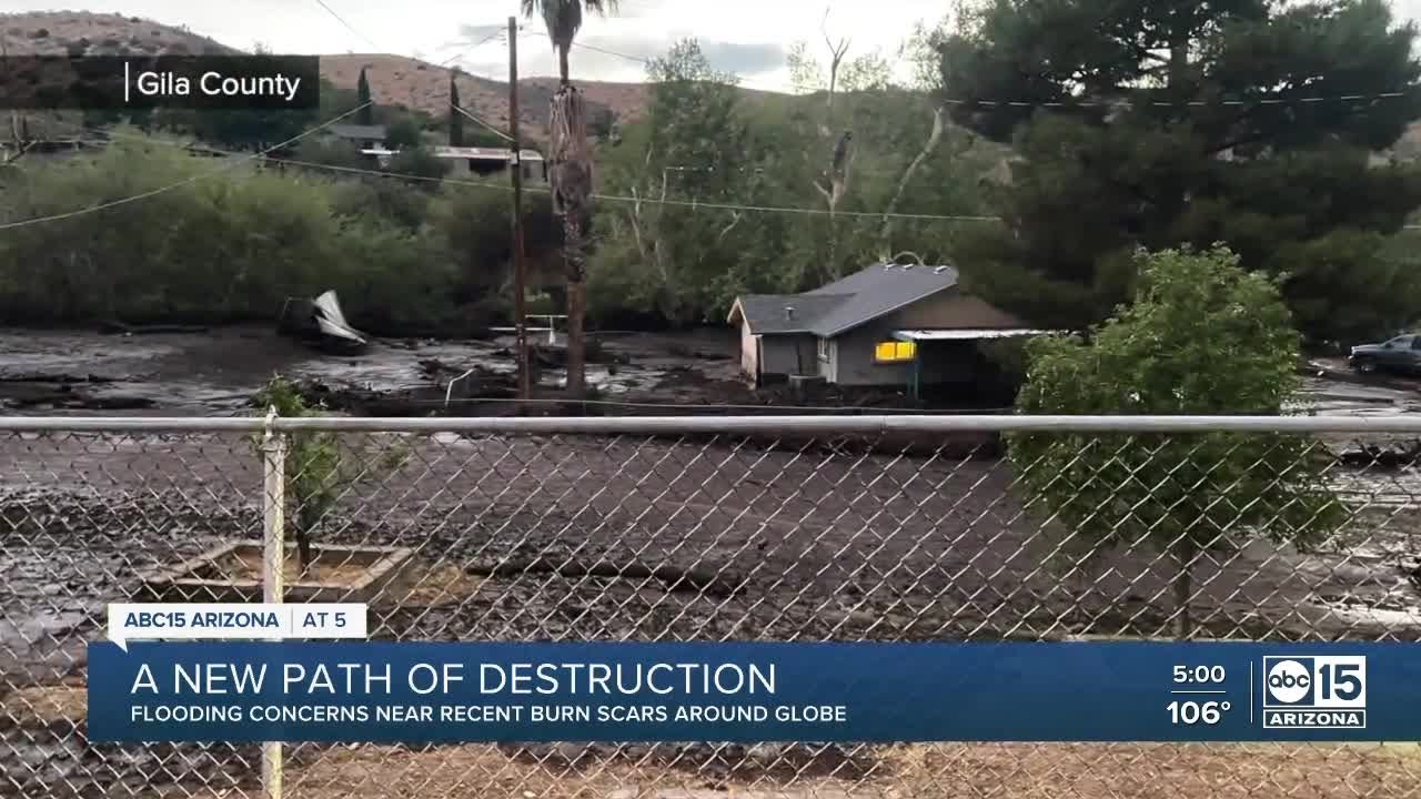 Homes damaged from debris flow along Gila County burn scars