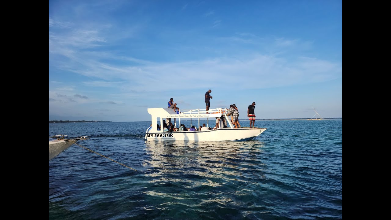 GLASS BOTTOM BOAT TOUR, ROBINSON ISLAND DIANI, KENYA.