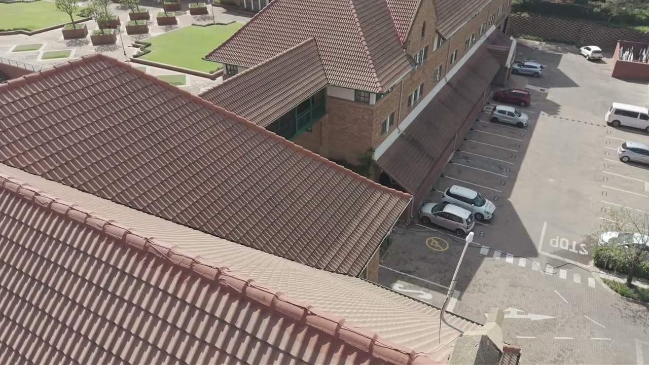 Alpha Apartments roof inspection