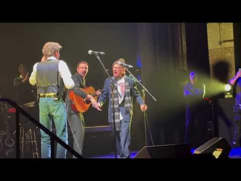 Art Garfunkel surprises the cast of The Simon & Garfunkel Story onstage in Staten Island, New York