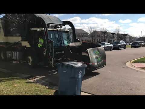 Groot Heil Freedom Picking Up Yard Waste and Garbage in Alleys