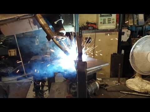 Robot welding rebar to plate