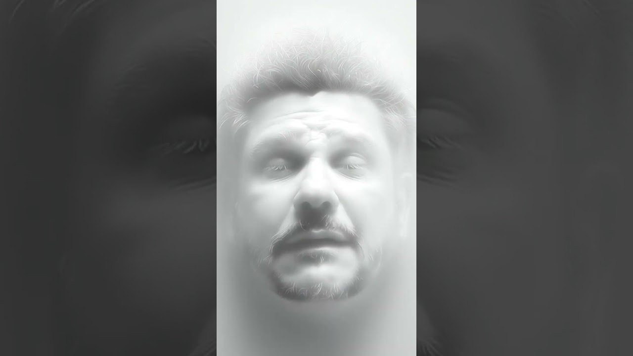 the face of a person made purely of light , white background