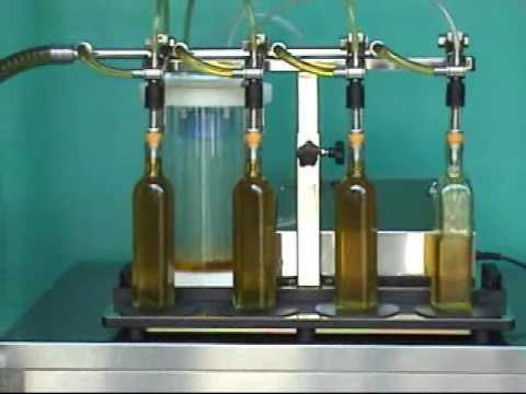 IC Filling Systems- VF 4 vacuum filler for oil wine and spirits in glass bottles