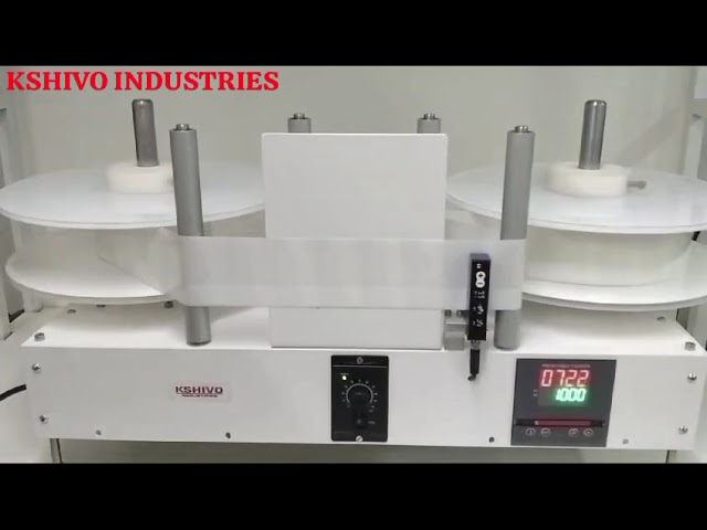 Label Rewinding Machine - Pouch Roll Rewinder and Batch Coding Manufacturer from Kalyan