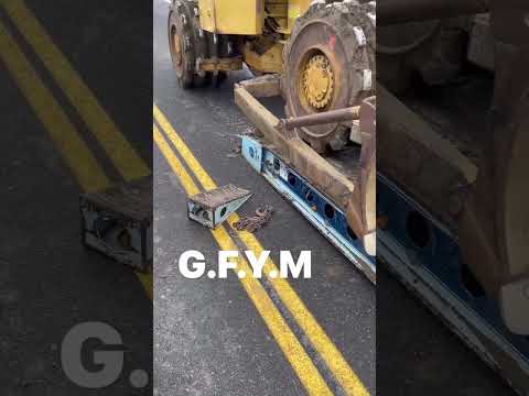 Cat 815 Compactor on top coat asphalt