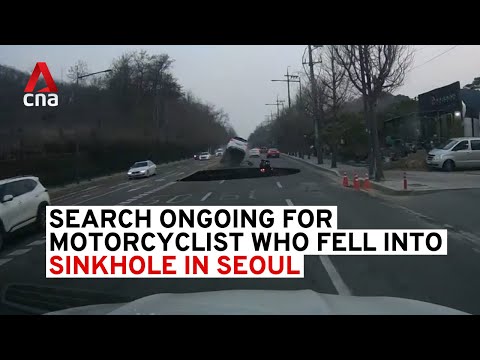 Rescuers search for motorcyclist swallowed by Seoul sinkhole